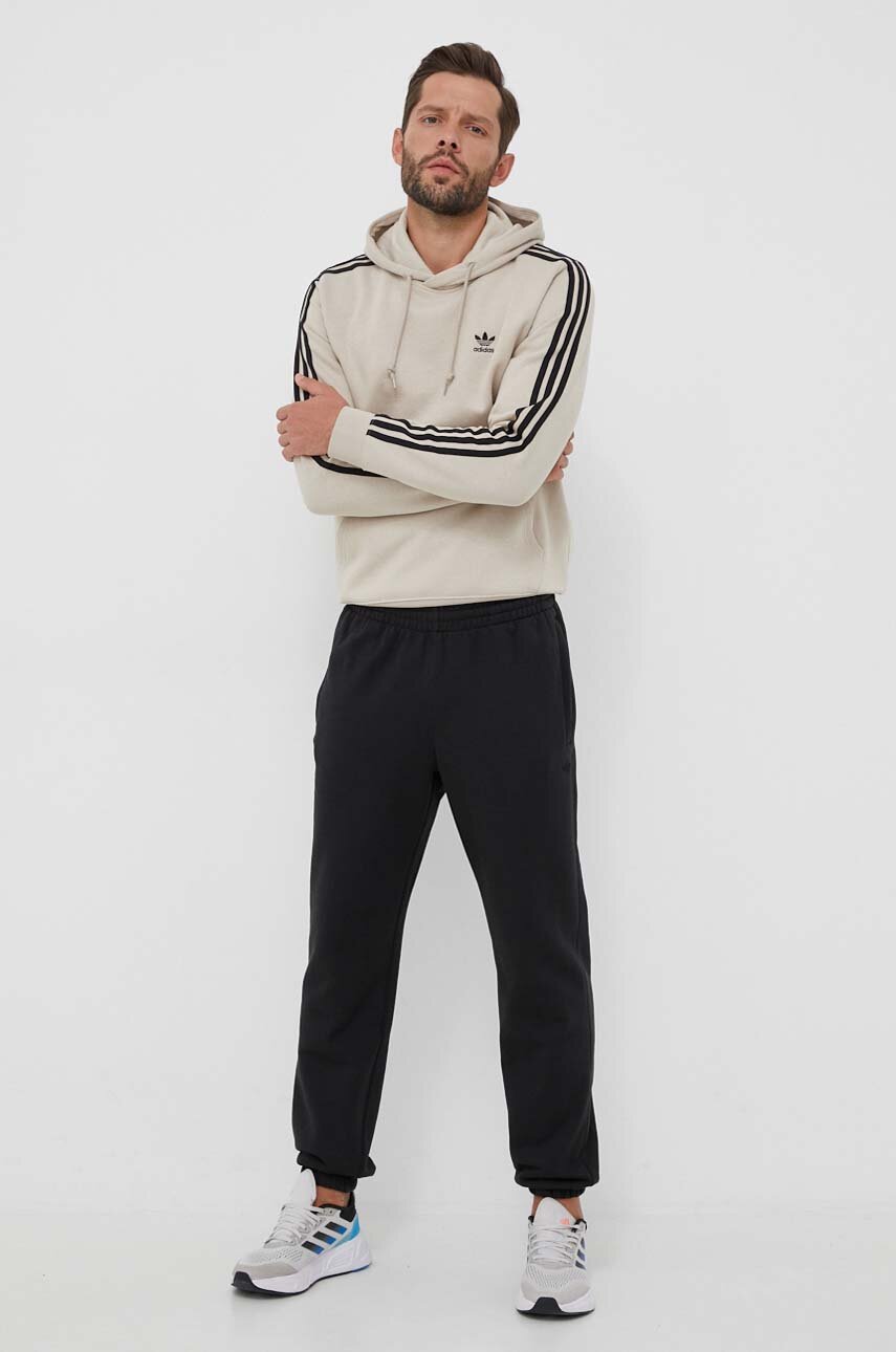 Хлопковые спортивные штаны adidas Originals цвет чёрный однотонные ...