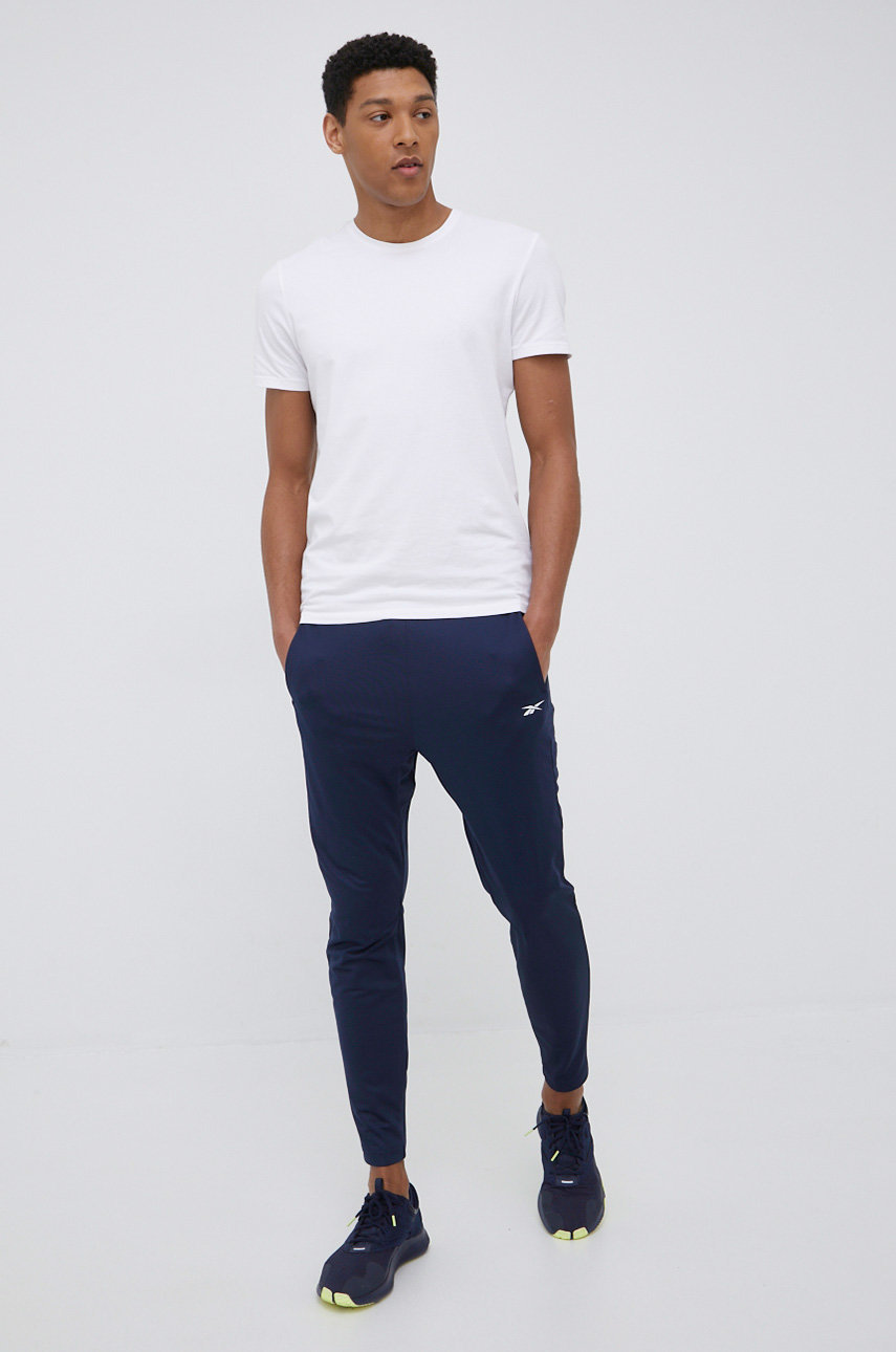 Reebok spodnie dresowe ID TRAIN męskie kolor granatowy gładkie GJ0840 ...