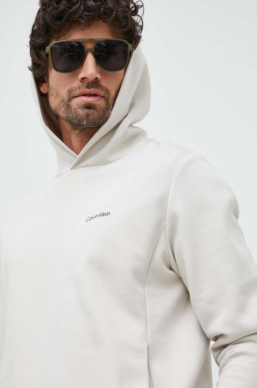 Кофта Calvin Klein чоловіча колір бежевий з капюшоном однотонна ...