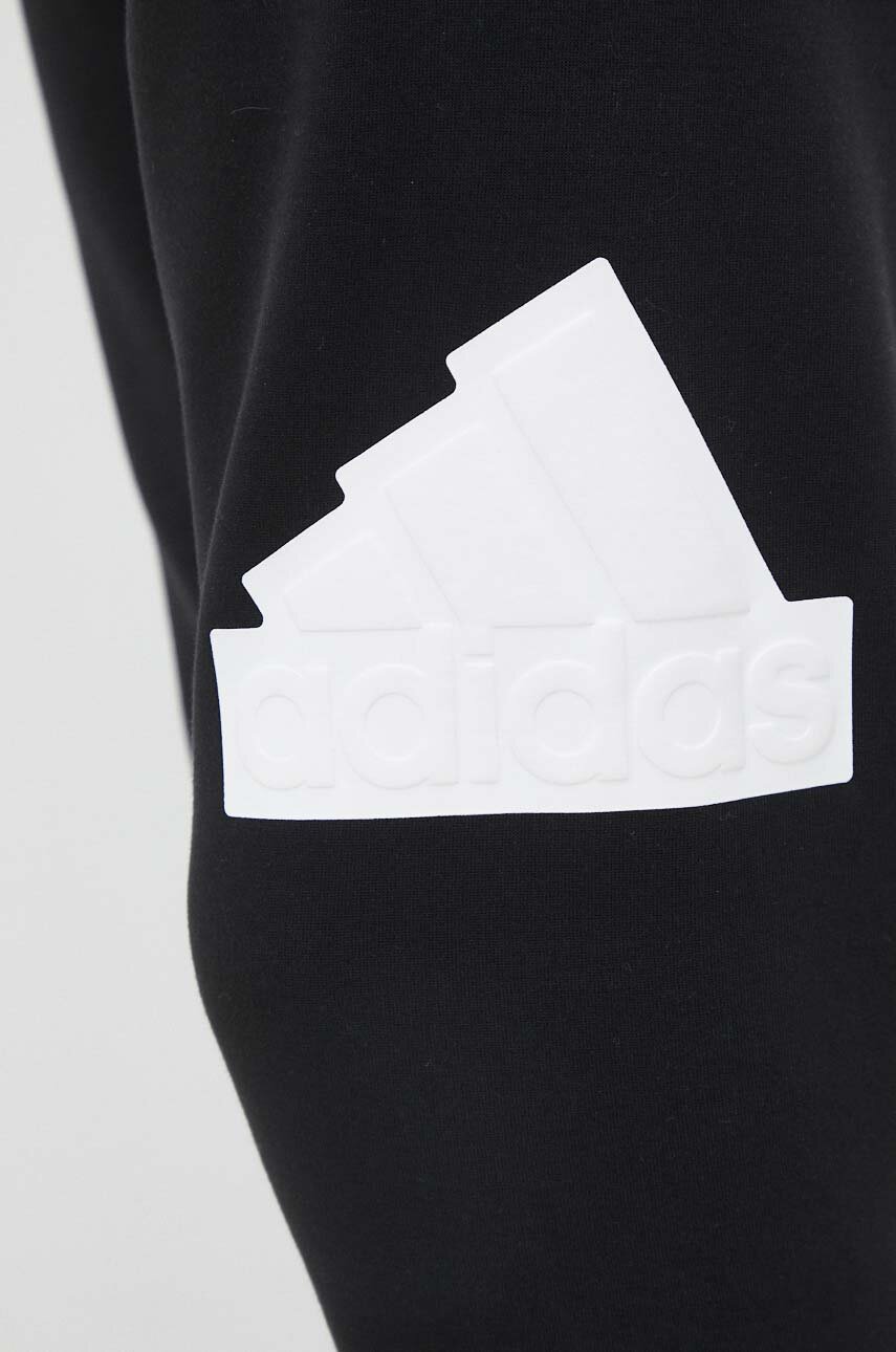 Tepláky adidas čierna farba, s nášivkou | ANSWEAR.sk