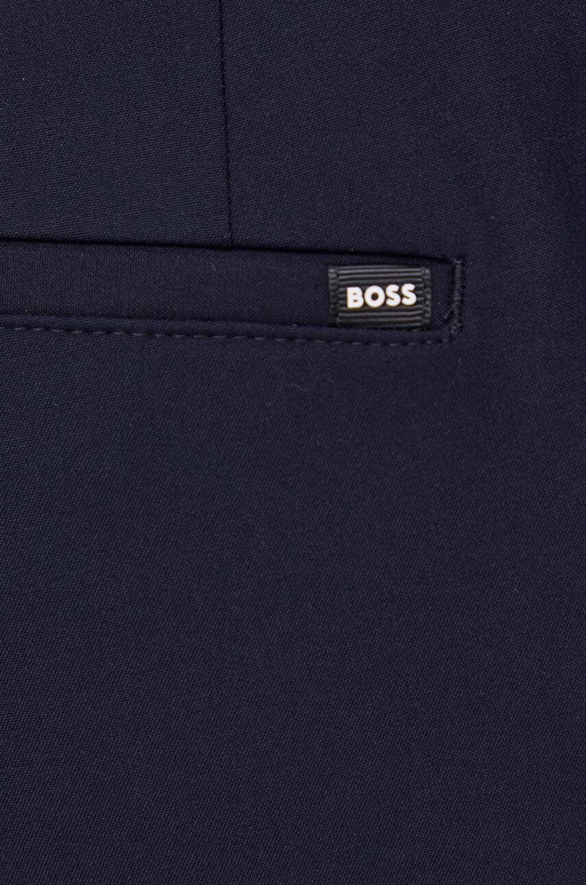 BOSS spodnie męskie kolor granatowy dopasowane | Answear.com