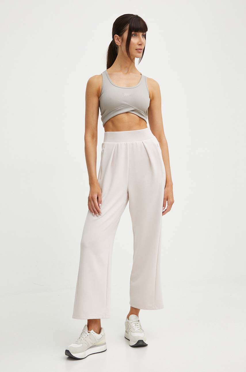 Reebok top do jogi Lux Studio Rib kolor beżowy 100076305 | Answear.com