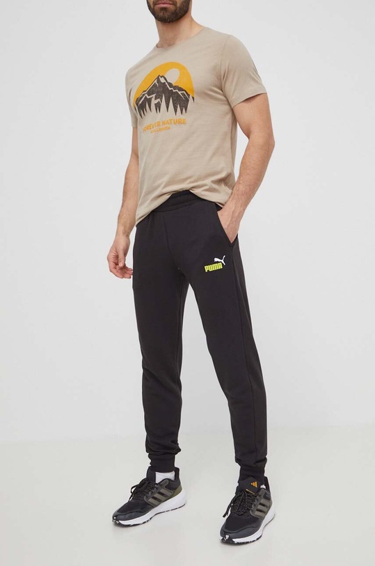 Tepláky Puma, barva černá | ANSWEAR.cz